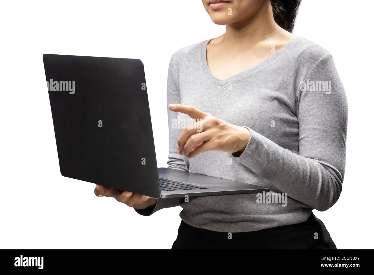 Asian woman finger point at computer notebook isolated on white ...