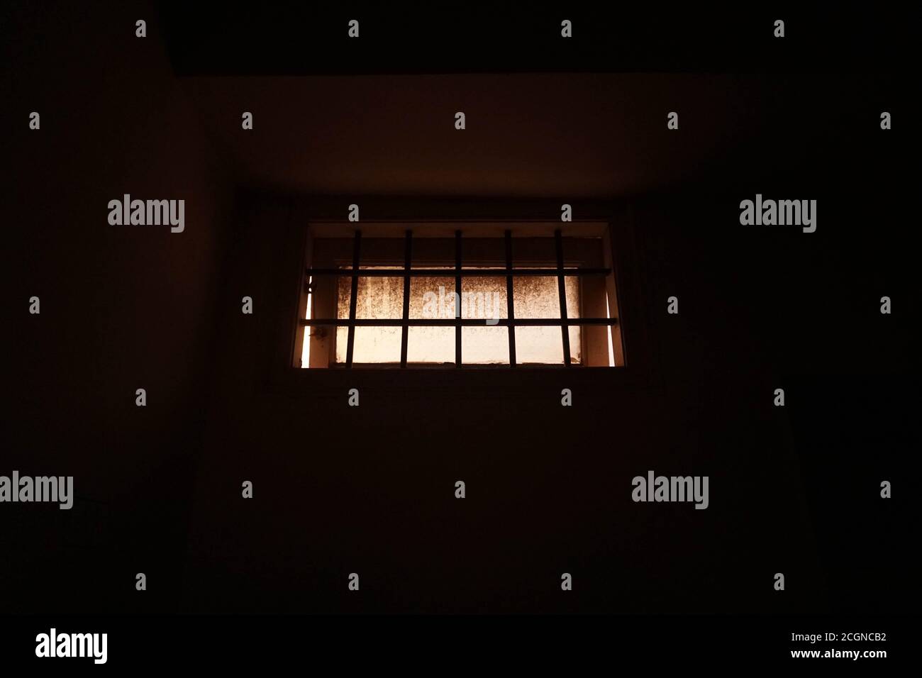 light throung the window at a yellow evening Stock Photo - Alamy