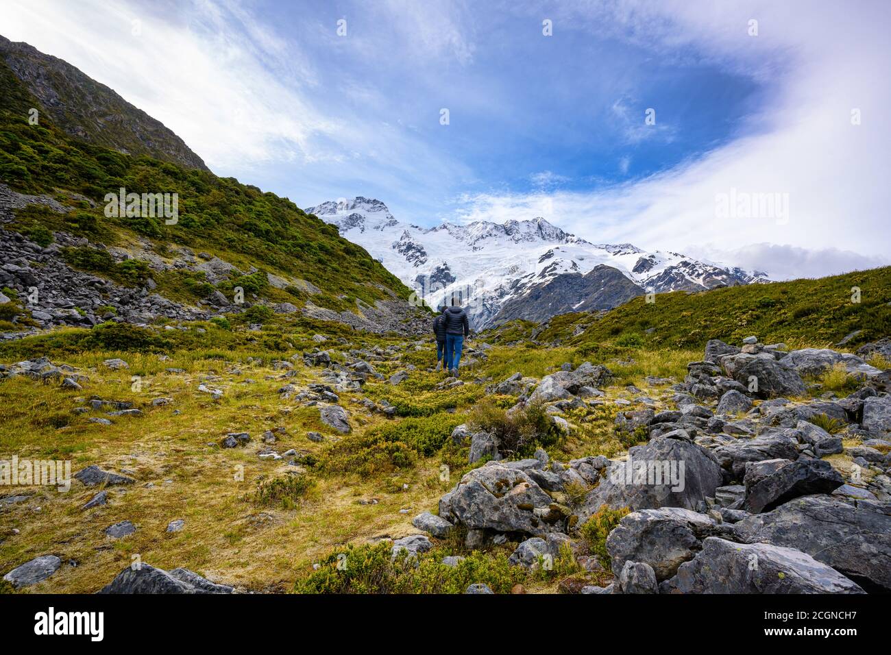 Two tourists are walking to the Kea Point Track in Mount Cook National ...