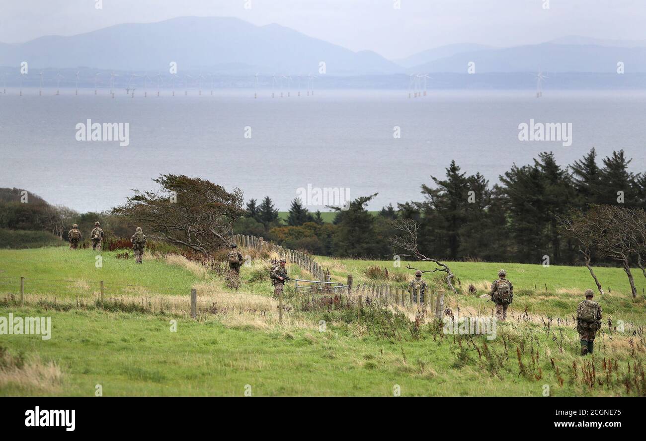 Soldiers from the Royal Scots Dragoon Guards patrolling during Exercise ...