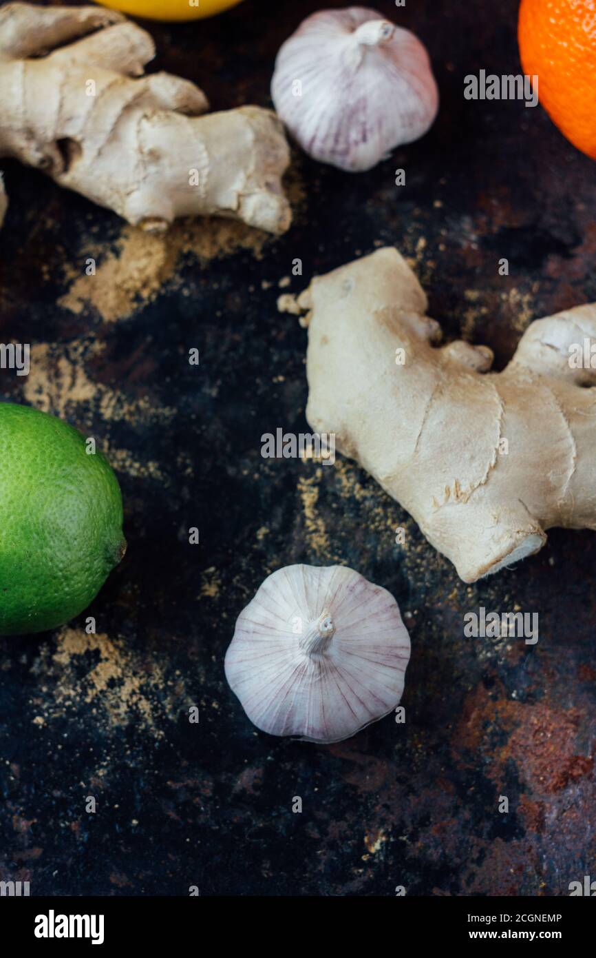Citrus fruits with garlic and ginger root Stock Photo - Alamy