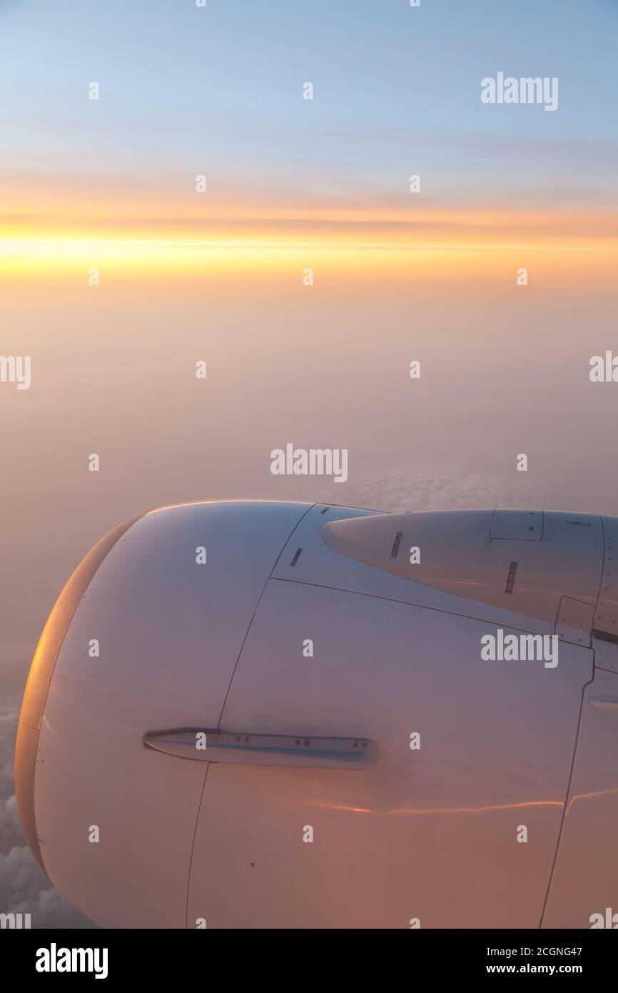 Airplane engine with sunrise in the horizon Stock Photo - Alamy