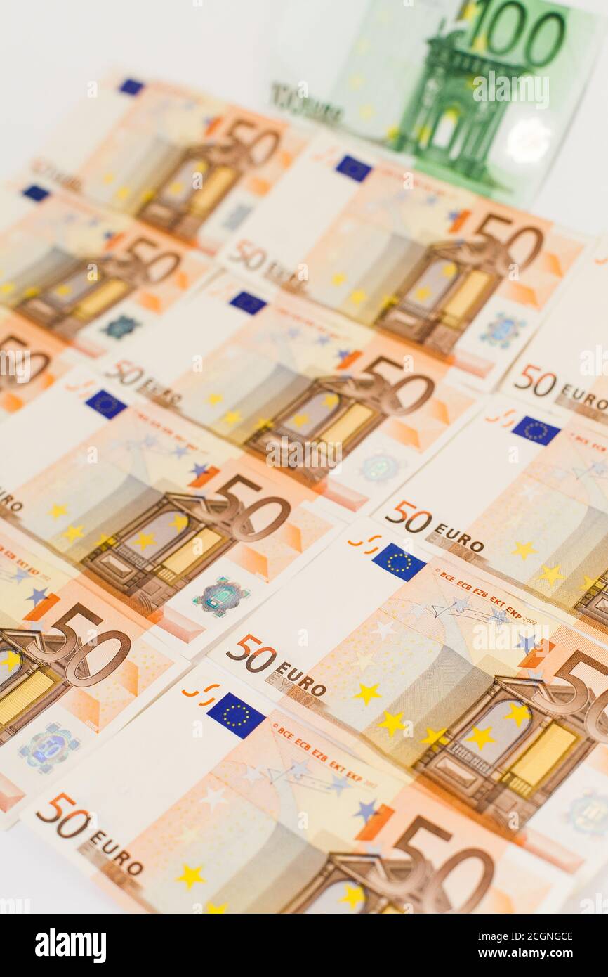 one hundred euro on top of banknotes Stock Photo - Alamy