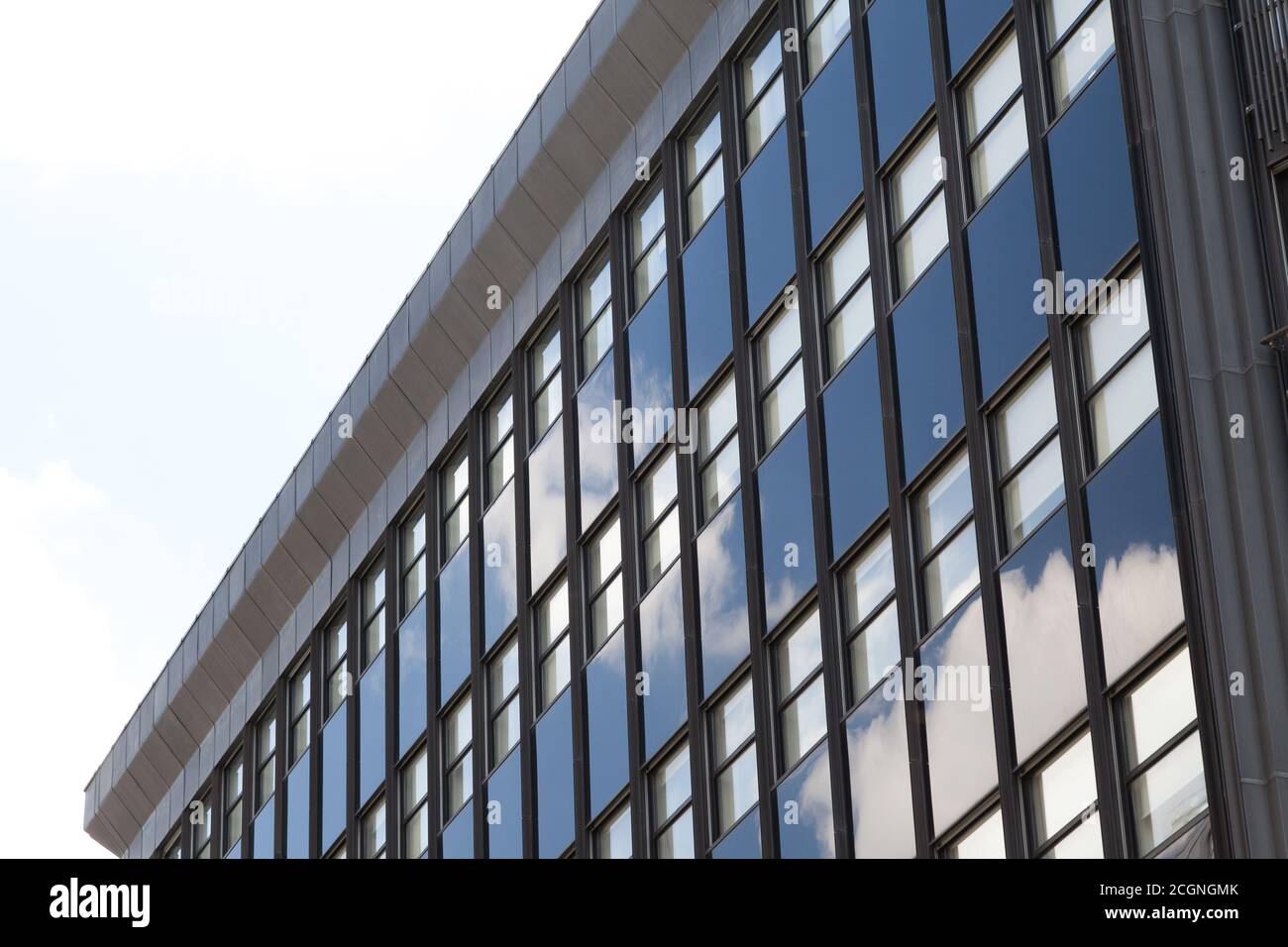 rows of office building windows with sky Stock Photo - Alamy