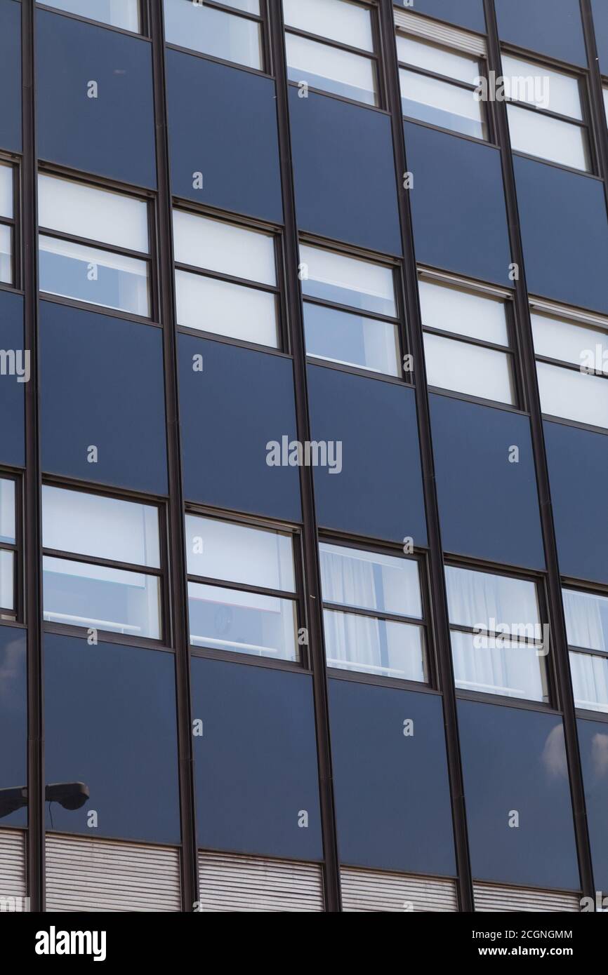 Vertical office building windows in frames Stock Photo - Alamy