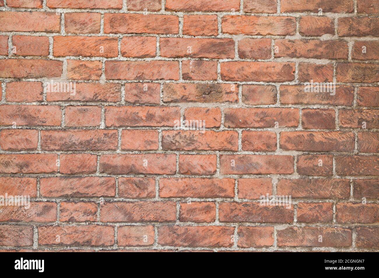 sunlit red brick wall Stock Photo - Alamy