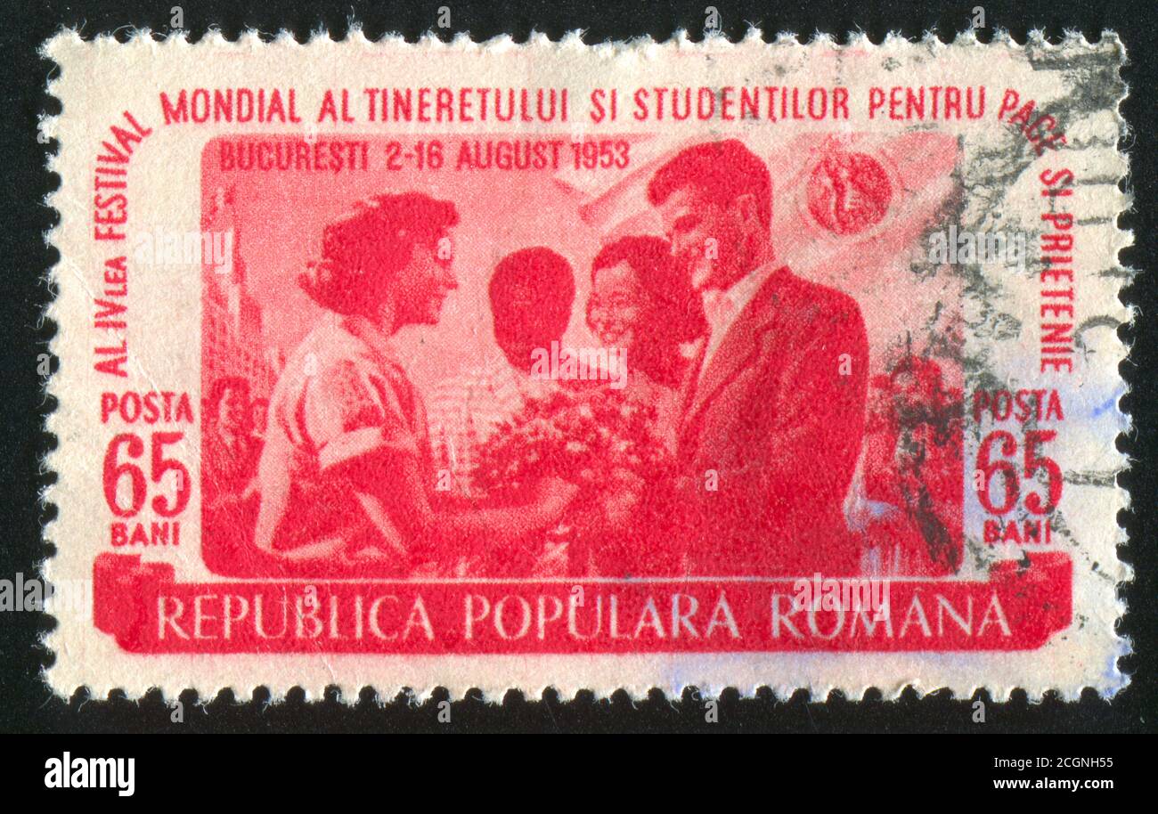 ROMANIA - CIRCA 1953: stamp printed by Romania, shows Students Offering ...