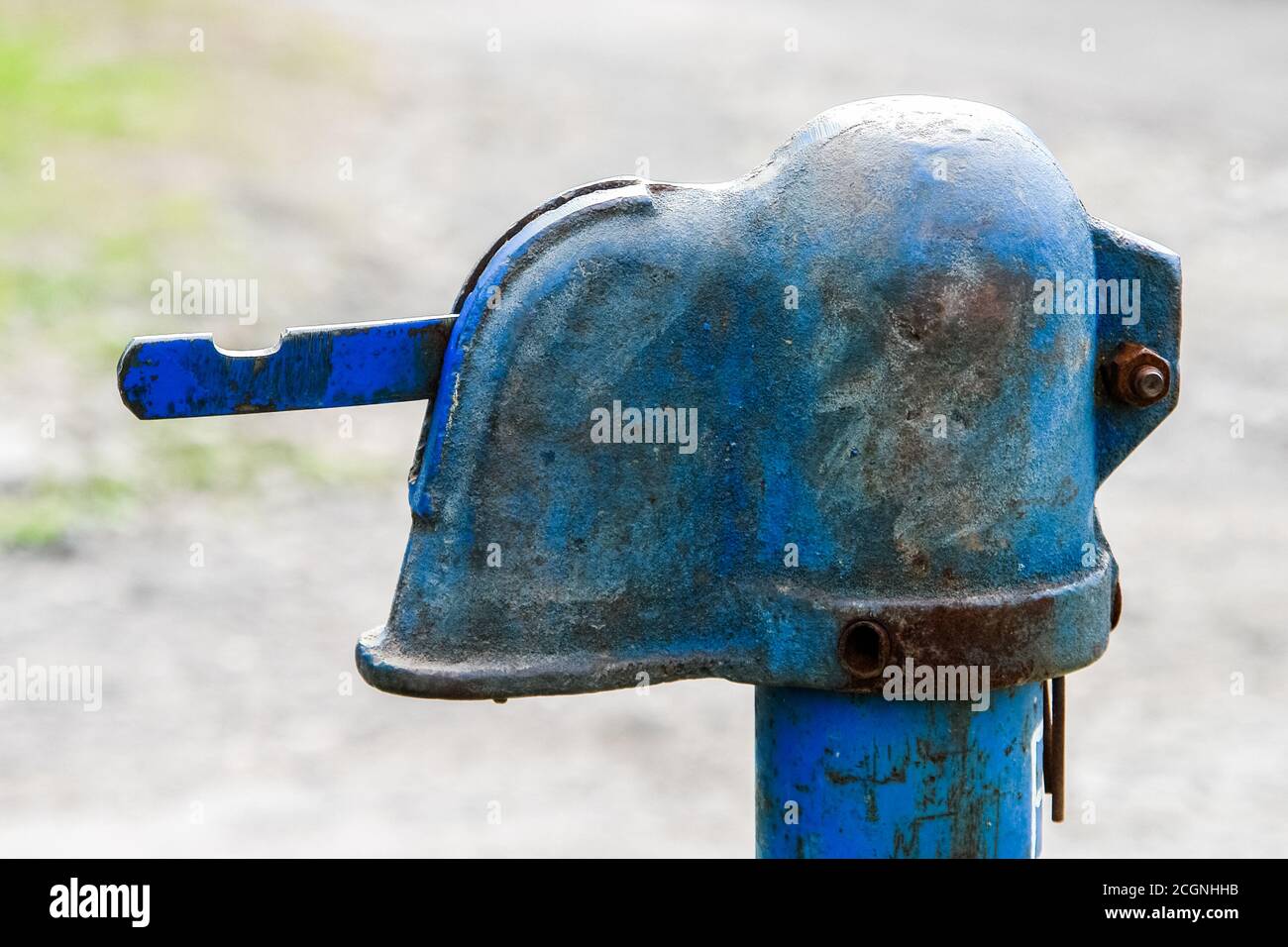 Old metal water pump on russian slum village Stock Photo - Alamy