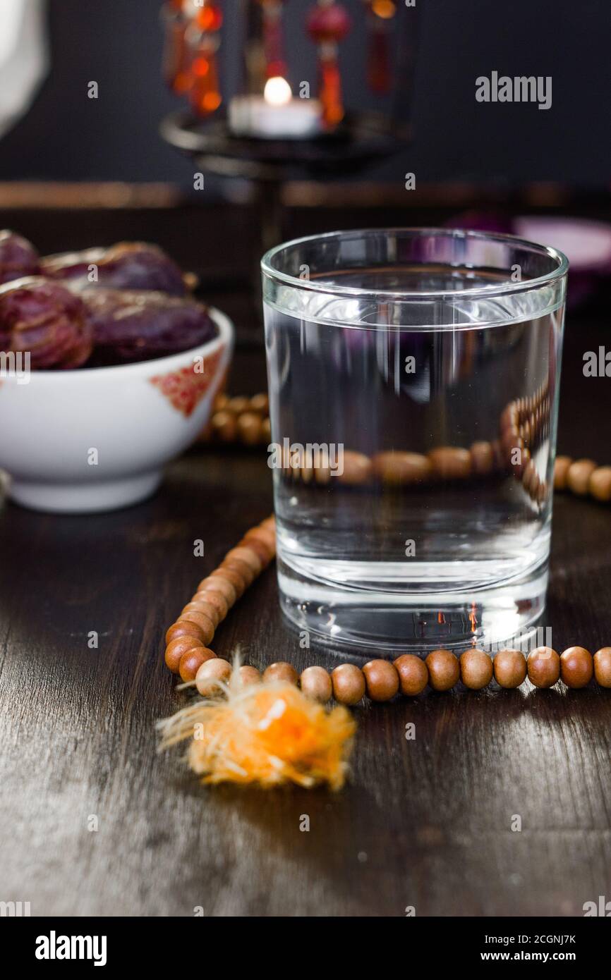 Glass of water for iftar opening on month ramadan Stock Photo - Alamy