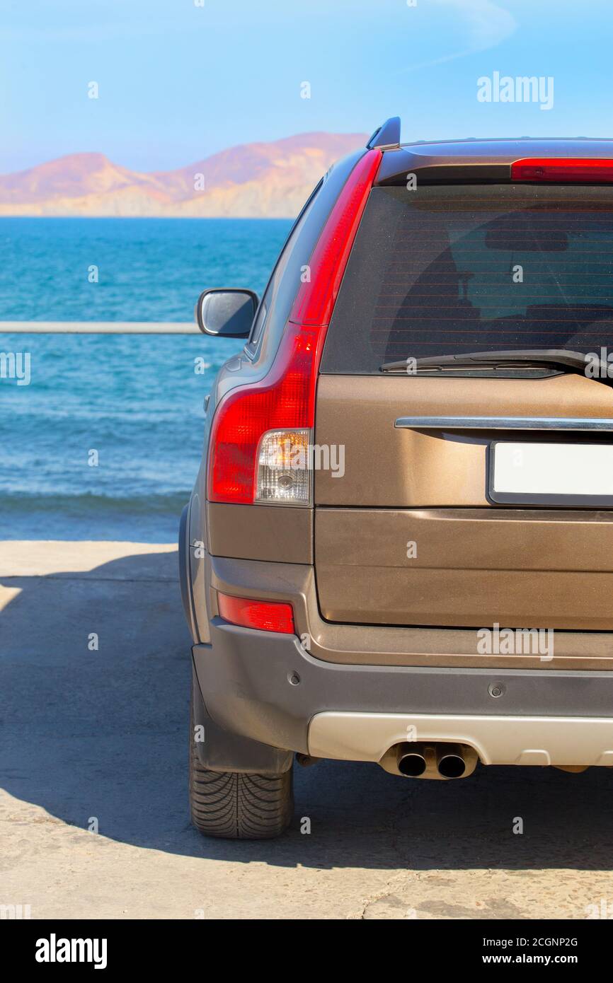 Car on the sea promenade on a sunny summer day Stock Photo - Alamy