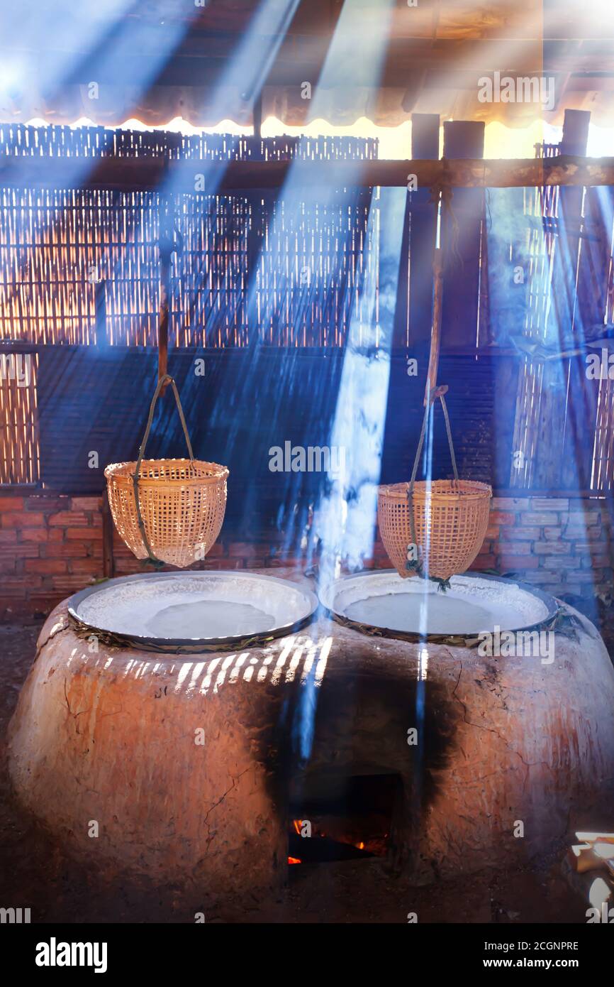 Boiling rock salt on clay oven, traditional boiling rock salt on ...