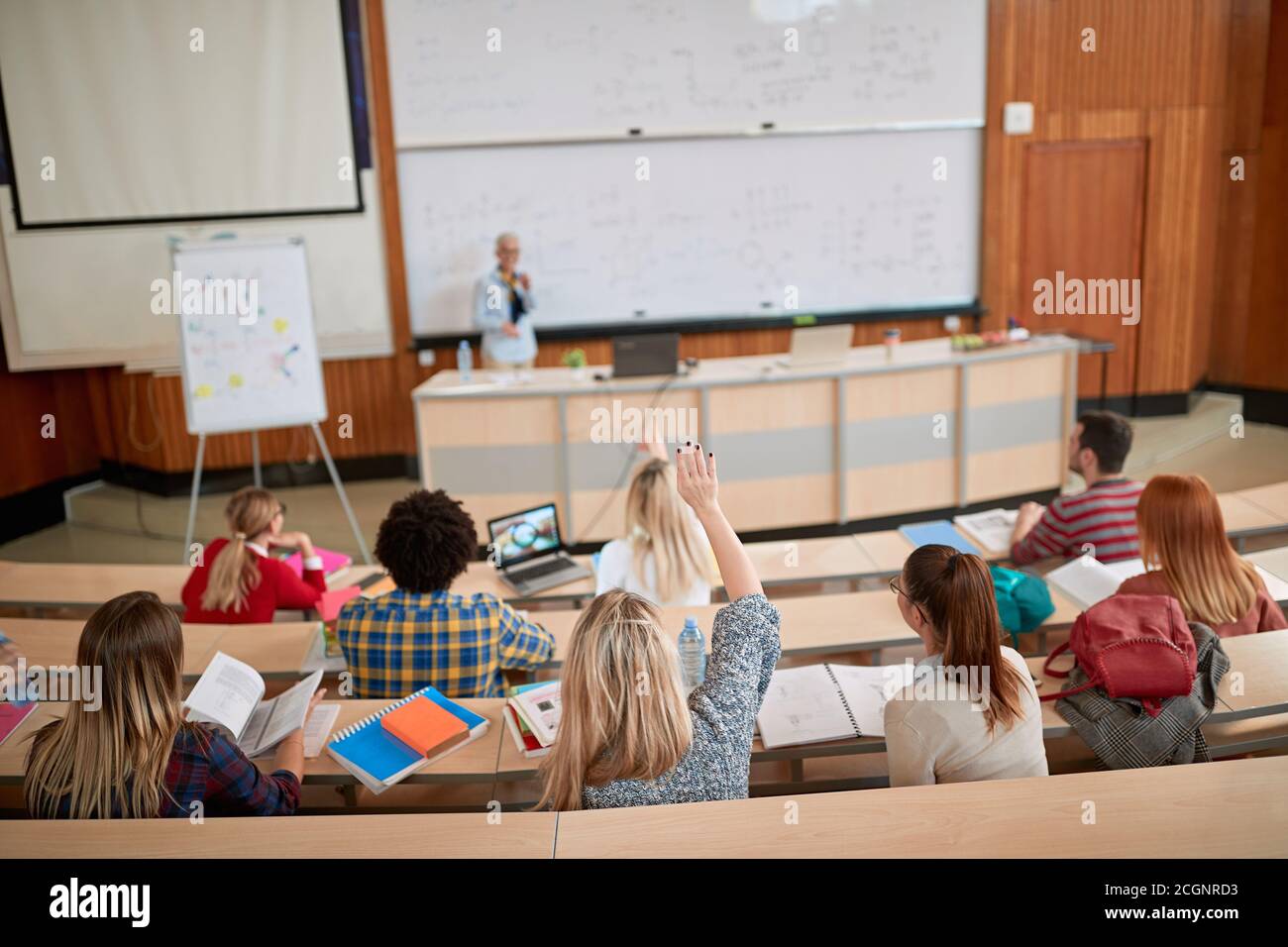 Students at a lecture in amphitheatre Stock Photo - Alamy