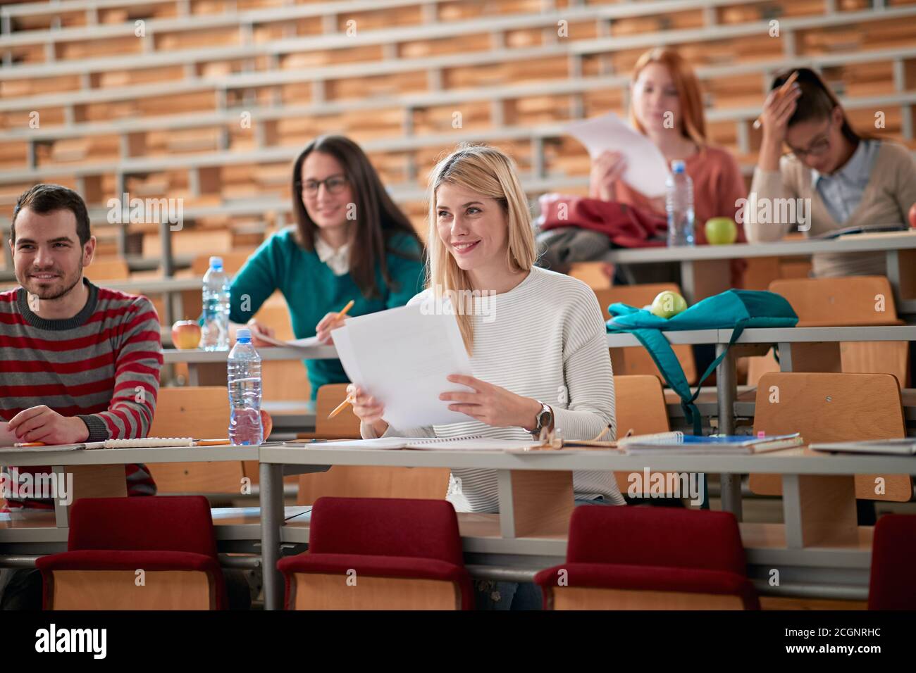 Students in a an amphitheatre satisfied about exam scores Stock Photo ...
