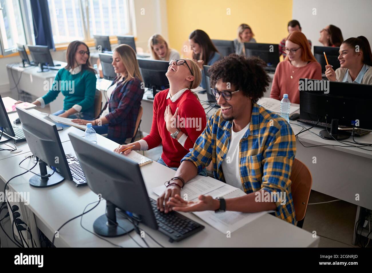 Students enjoying an informatics lecture in the university computer ...