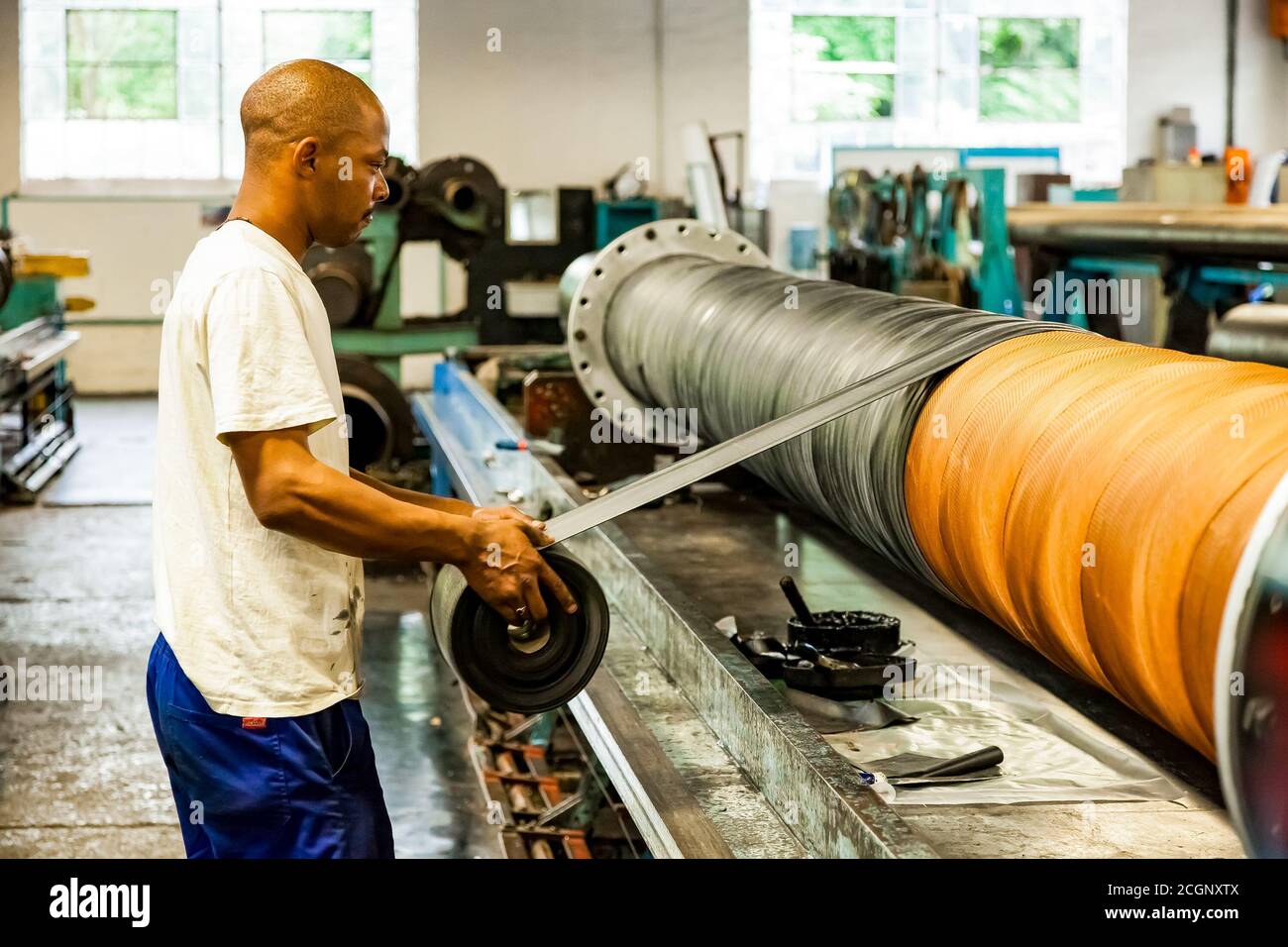 Johannesburg, South Africa - October 19, 2012: Diverse workers inside a ...