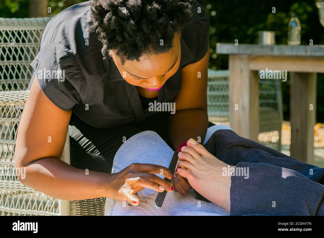 Johannesburg, South Africa - May 10, 2018: African women providing a ...