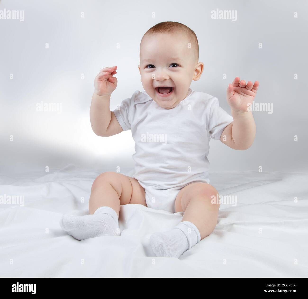Baby hands up hi-res stock photography and images - Alamy