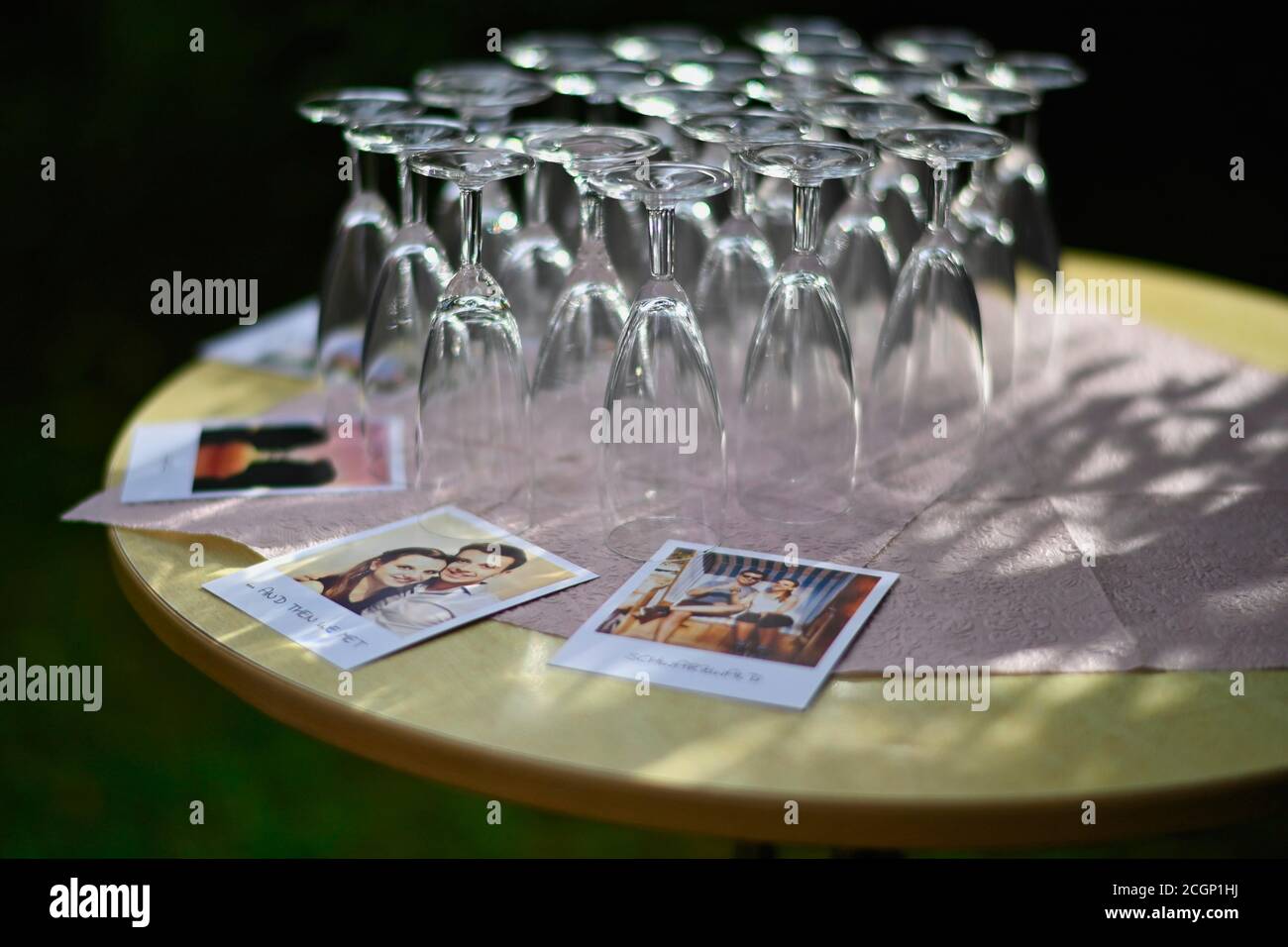 Champagne reception, champagne glasses and photos of a bridal couple ...
