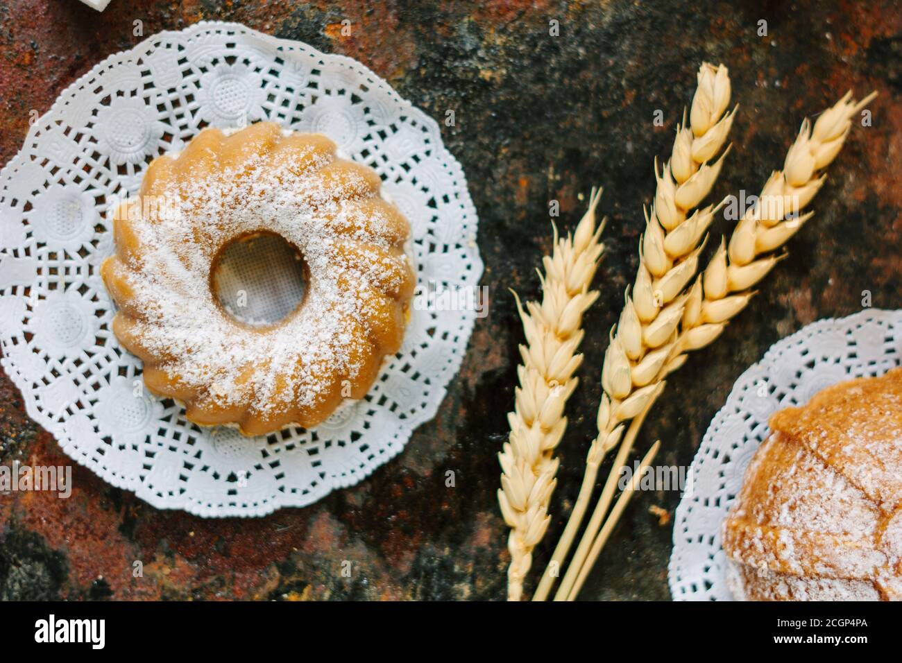 Sweet cake in form of circle over rustic surface Stock Photo - Alamy