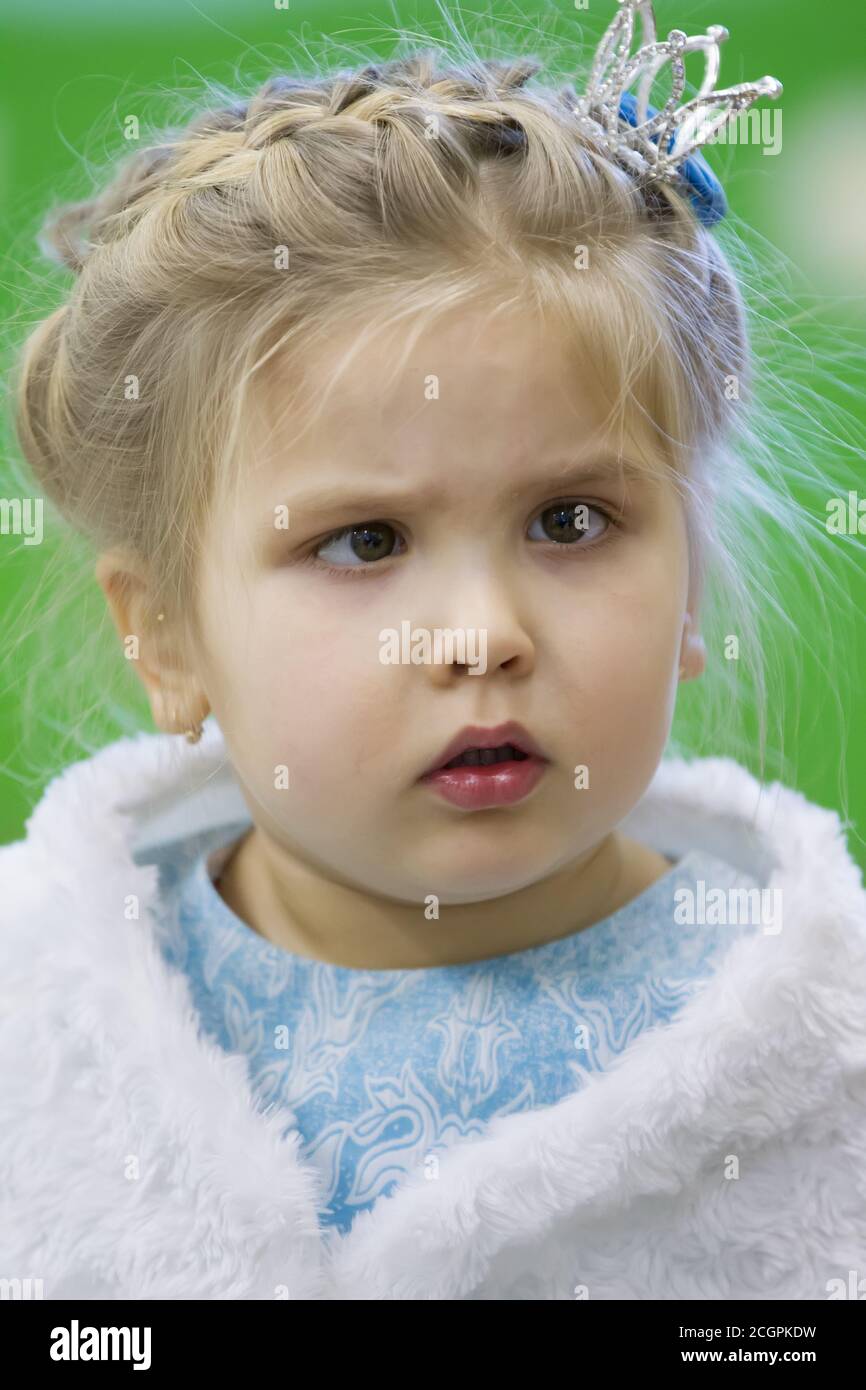 Parent day in kindergarten.Portrait of a little girl with strabismus ...