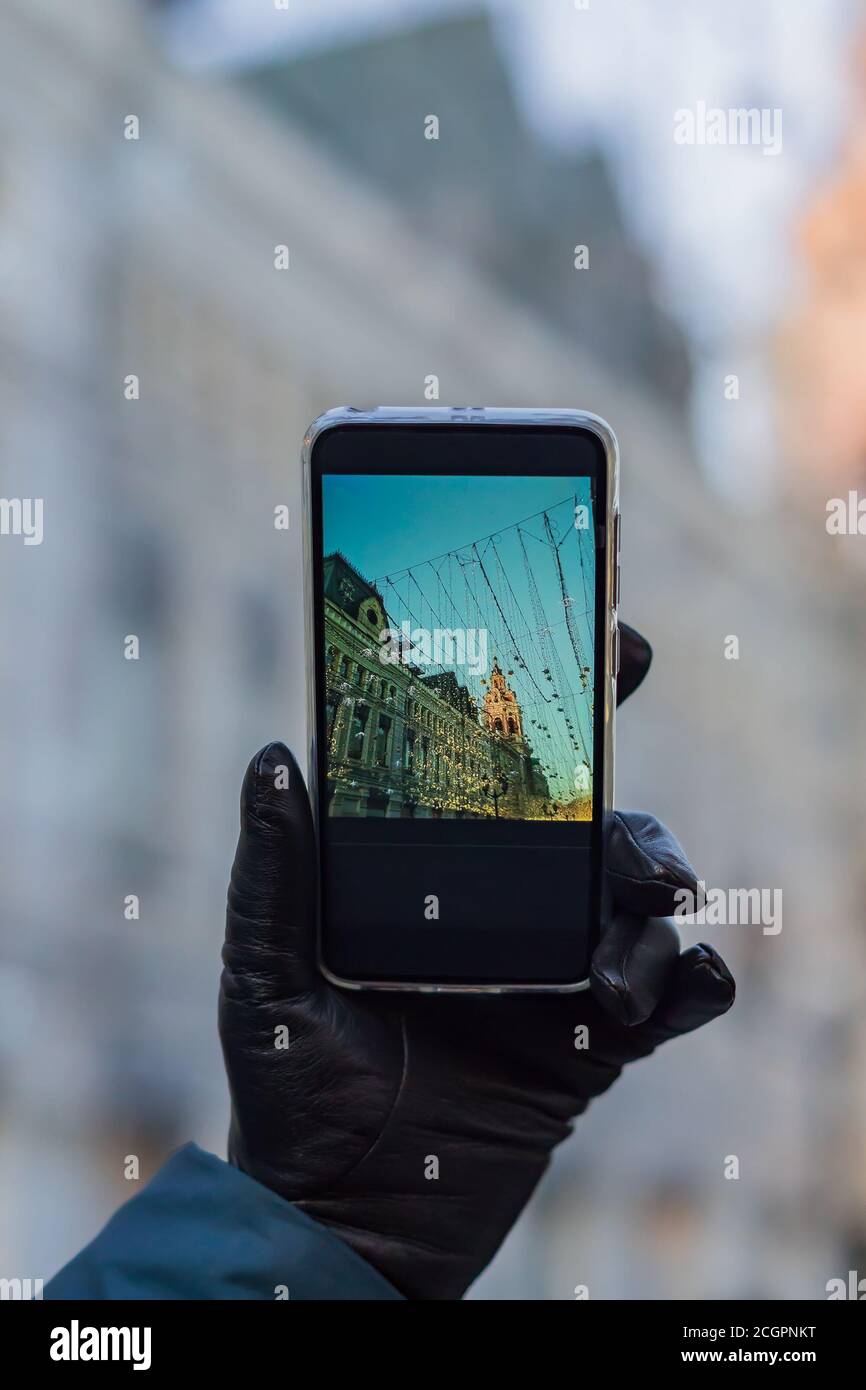 Black leather glove holding hi-res stock photography and images - Alamy