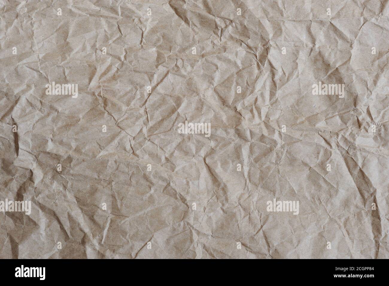 Brown crumpled wrapping paper background. Abstract background for ...