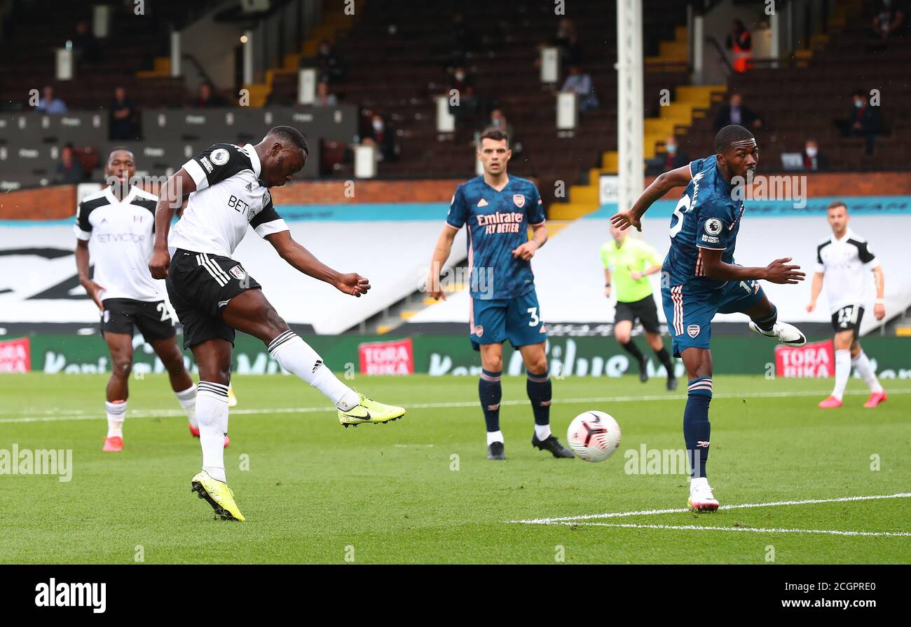 Fulham's Neeskens Kebano has a shot on goal during the Premier League ...