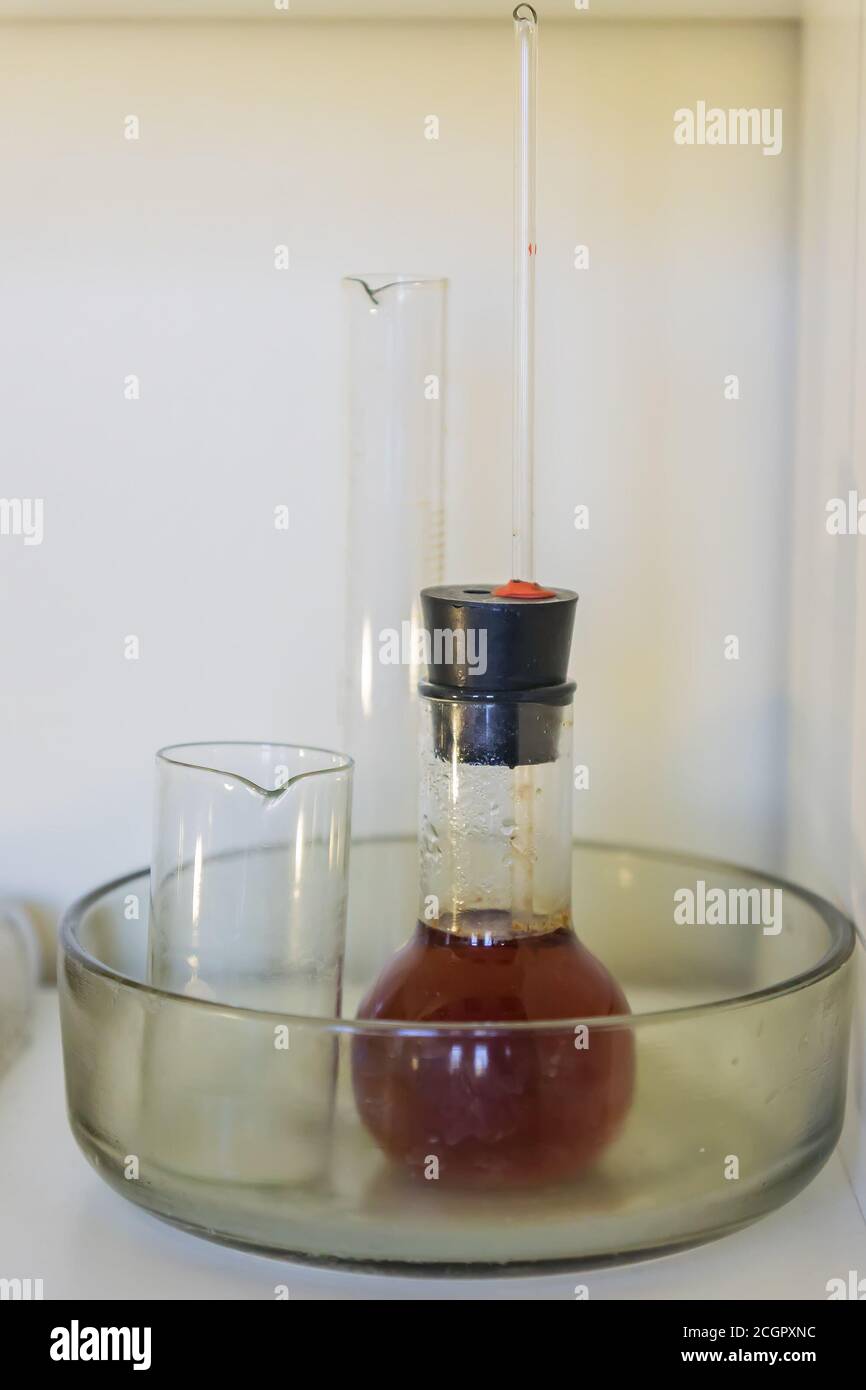 School laboratory stuff on a shelf - tube and flask. study of natural ...