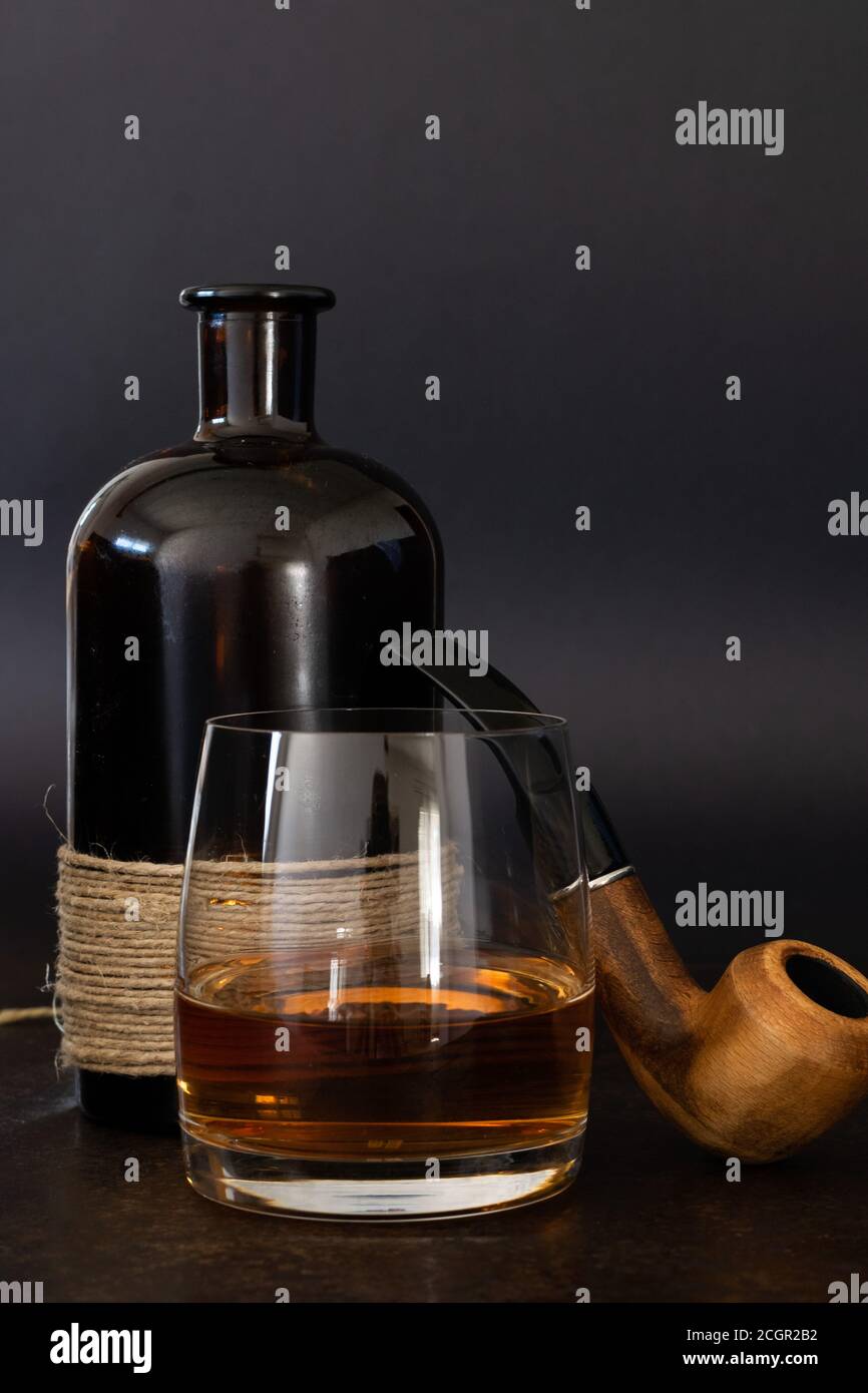 Isolated alcoholic drink on black background Stock Photo - Alamy