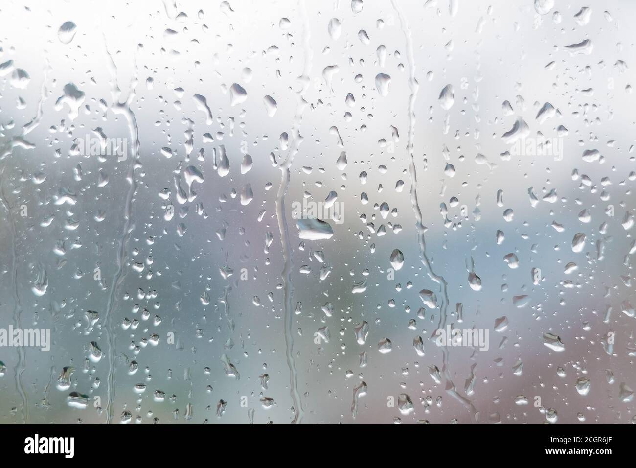 Rain drops on dark window glass. Abstract background texture Stock ...