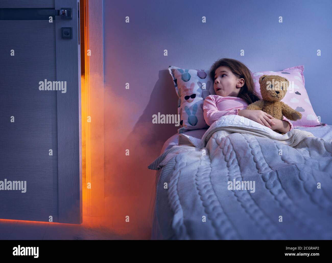 Nightmare for children. Little child girl is afraid of monsters in the ...