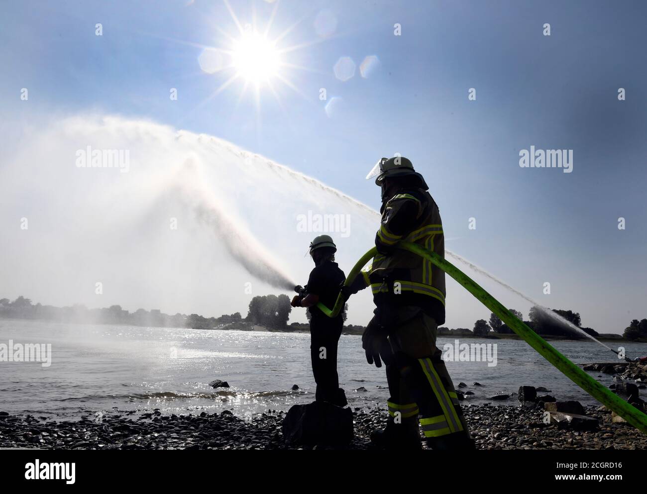 Fire hose handling hi-res stock photography and images - Alamy