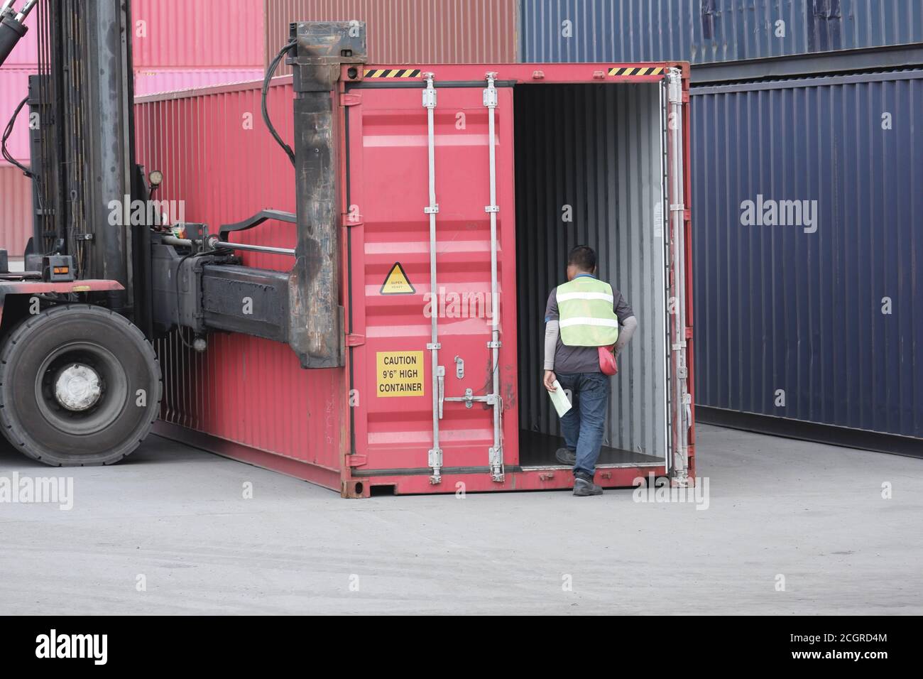 Container inspector in container ship branches for the background of ...