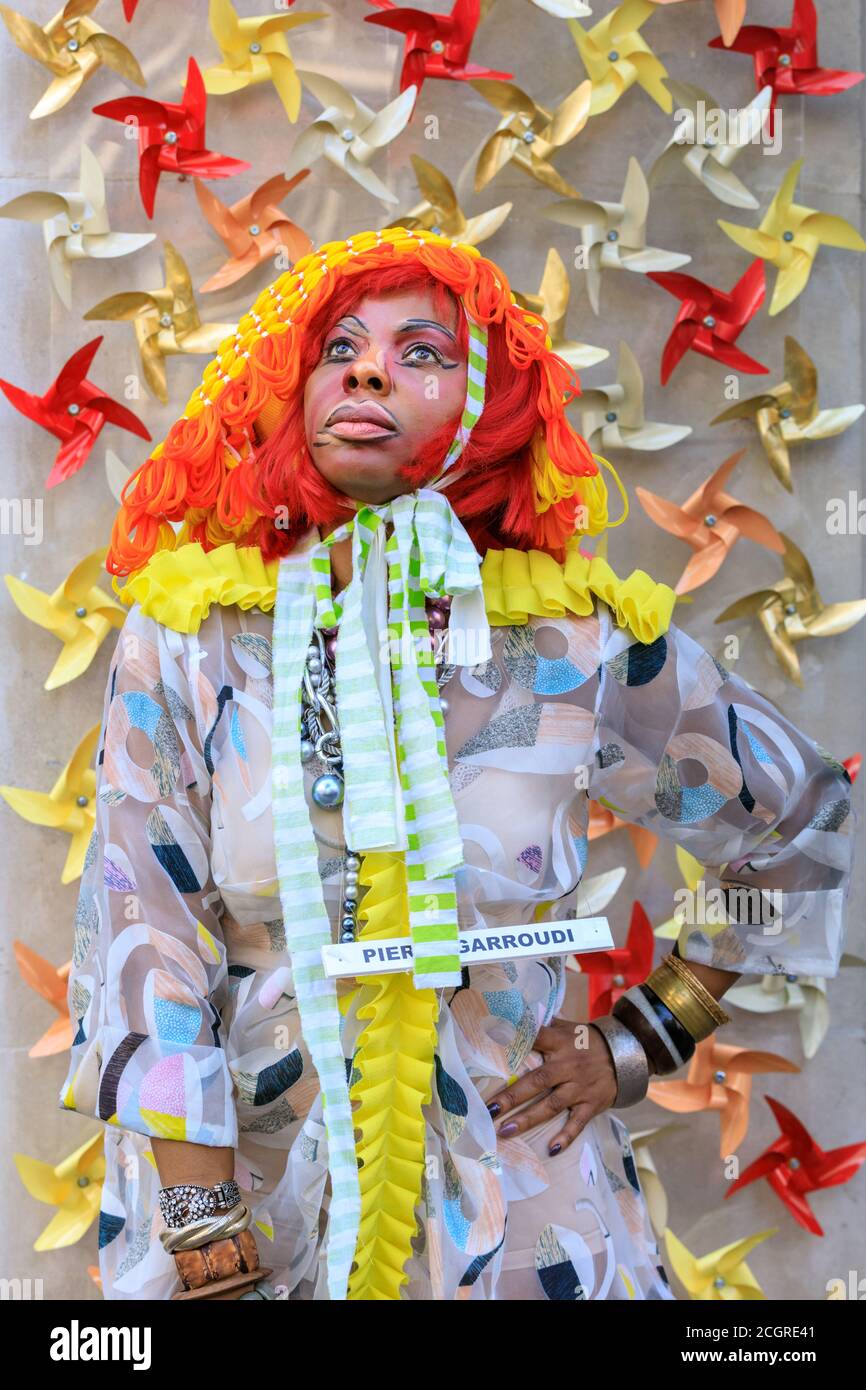 Mayfair, London, UK, 22 Jun 2019. A model poses in colourful hat ...