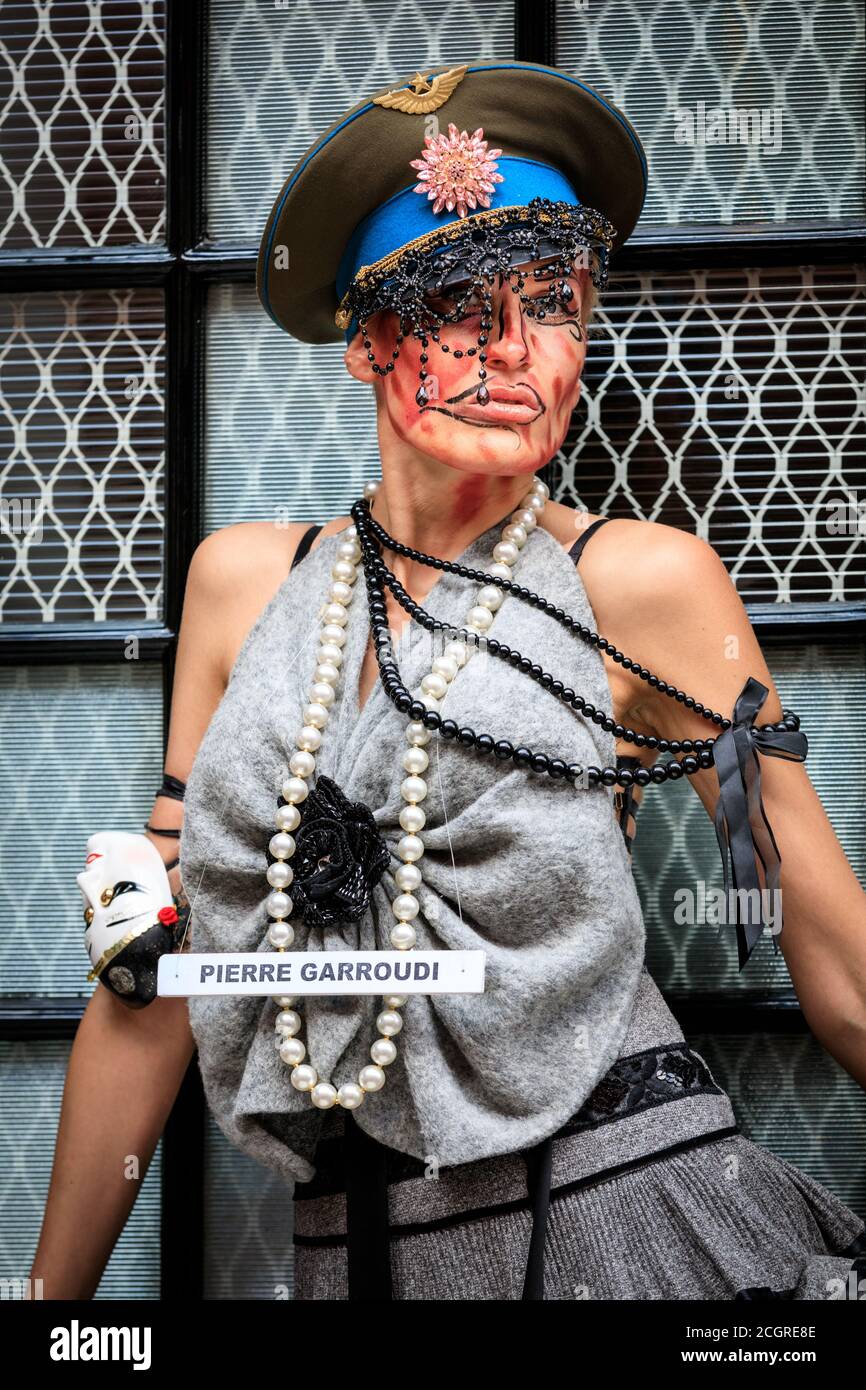 Mayfair, London, UK, 22 Jun 2019. Model poses in an extravagant ...