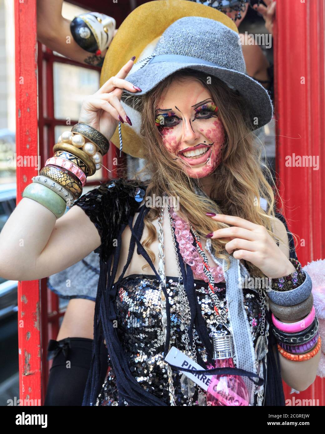 Mayfair, London, UK, 22 Jun 2019. A model poses in an extravagant ...
