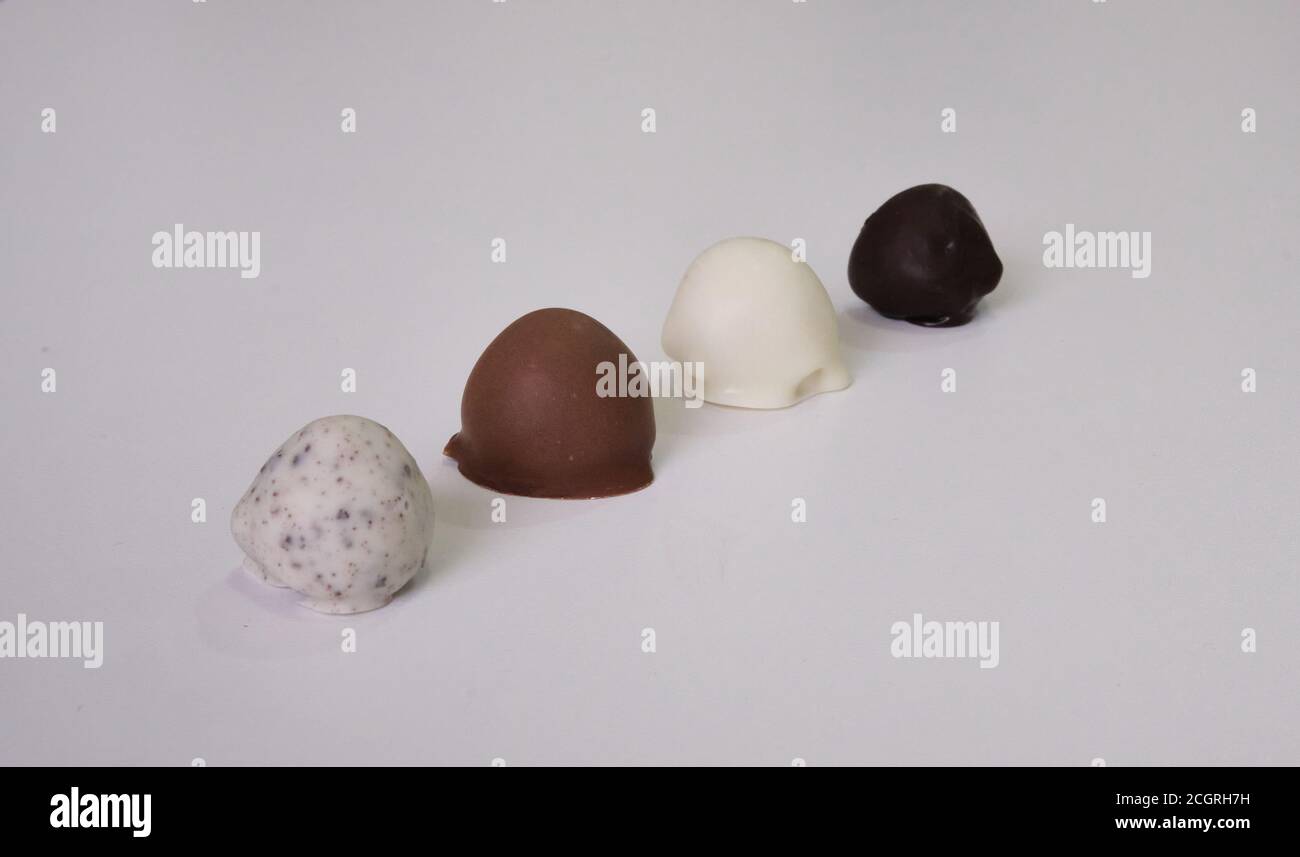 raspberries dipped or covered in mold chocolate cut in half. Different ...