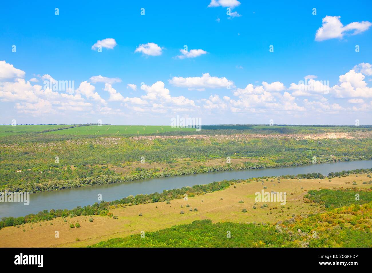 Untouched nature . Landscape with river and green hills Stock Photo - Alamy