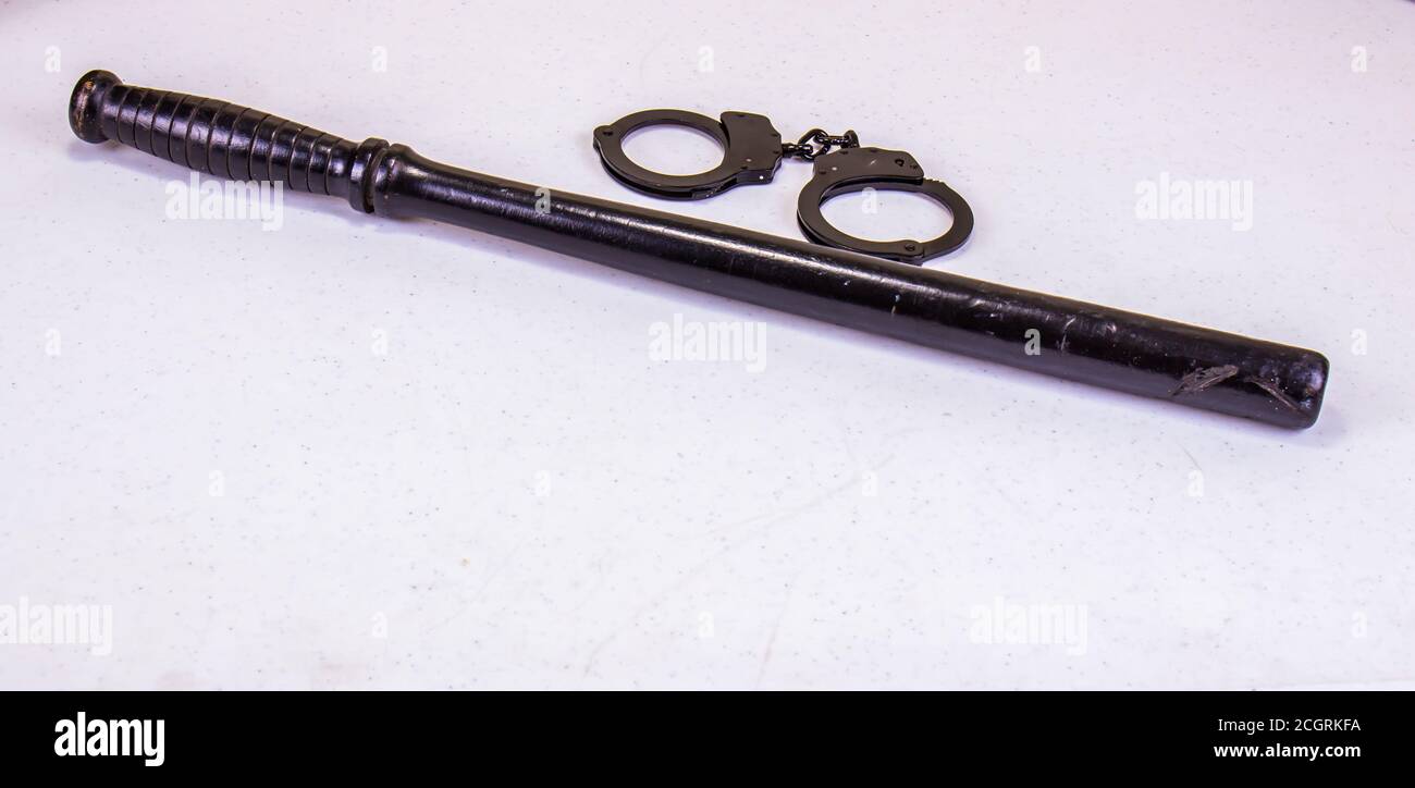Law Enforcement Police Handcuffs & Billy Club Stock Photo - Alamy