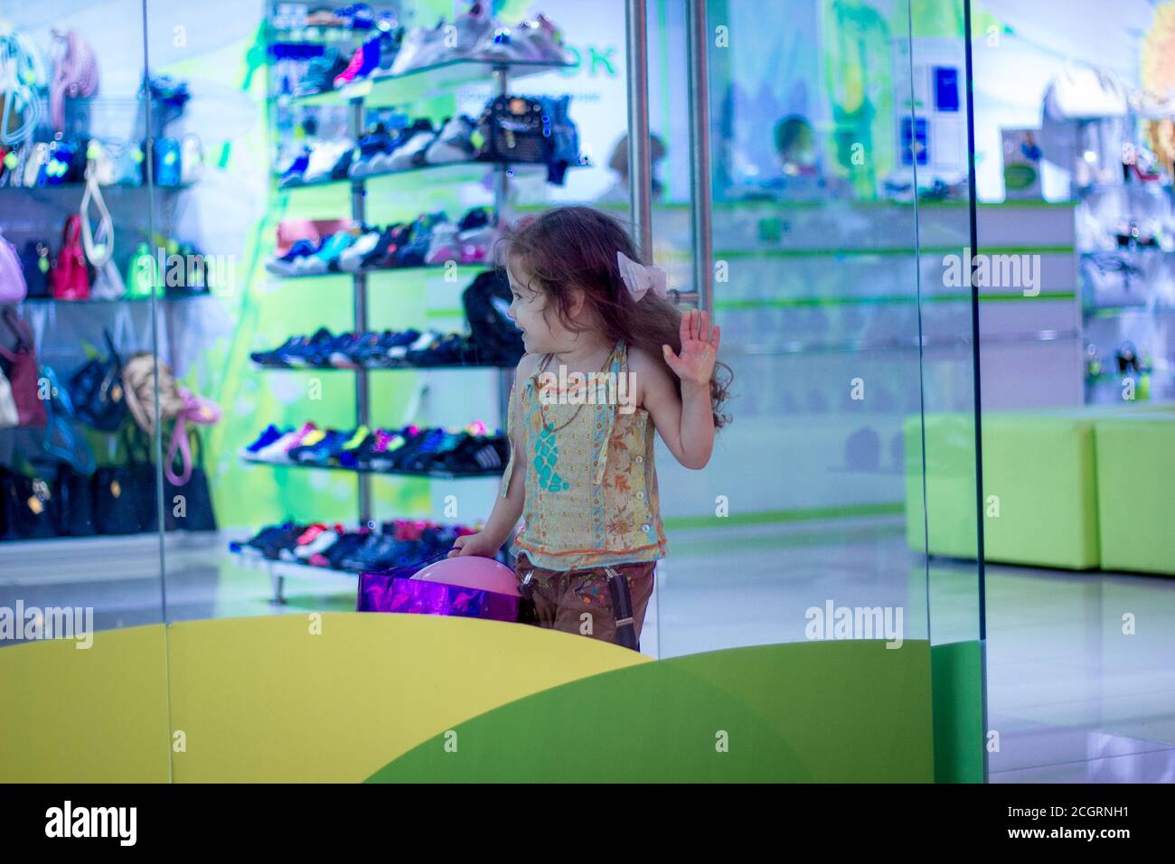 Beautiful girl having fun on the store Stock Photo - Alamy