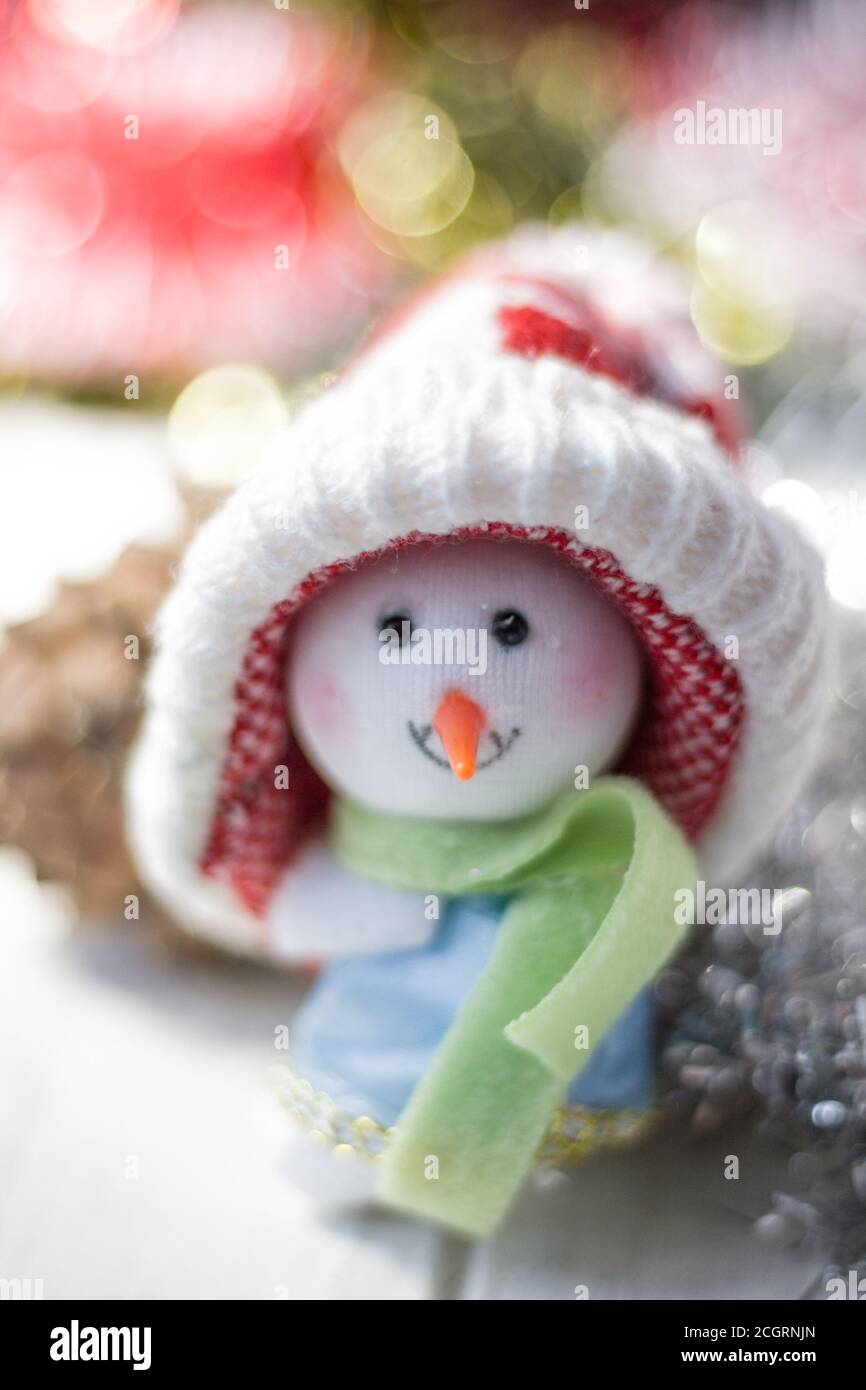 Christmas symbol - happy snowman in a red hat Stock Photo - Alamy