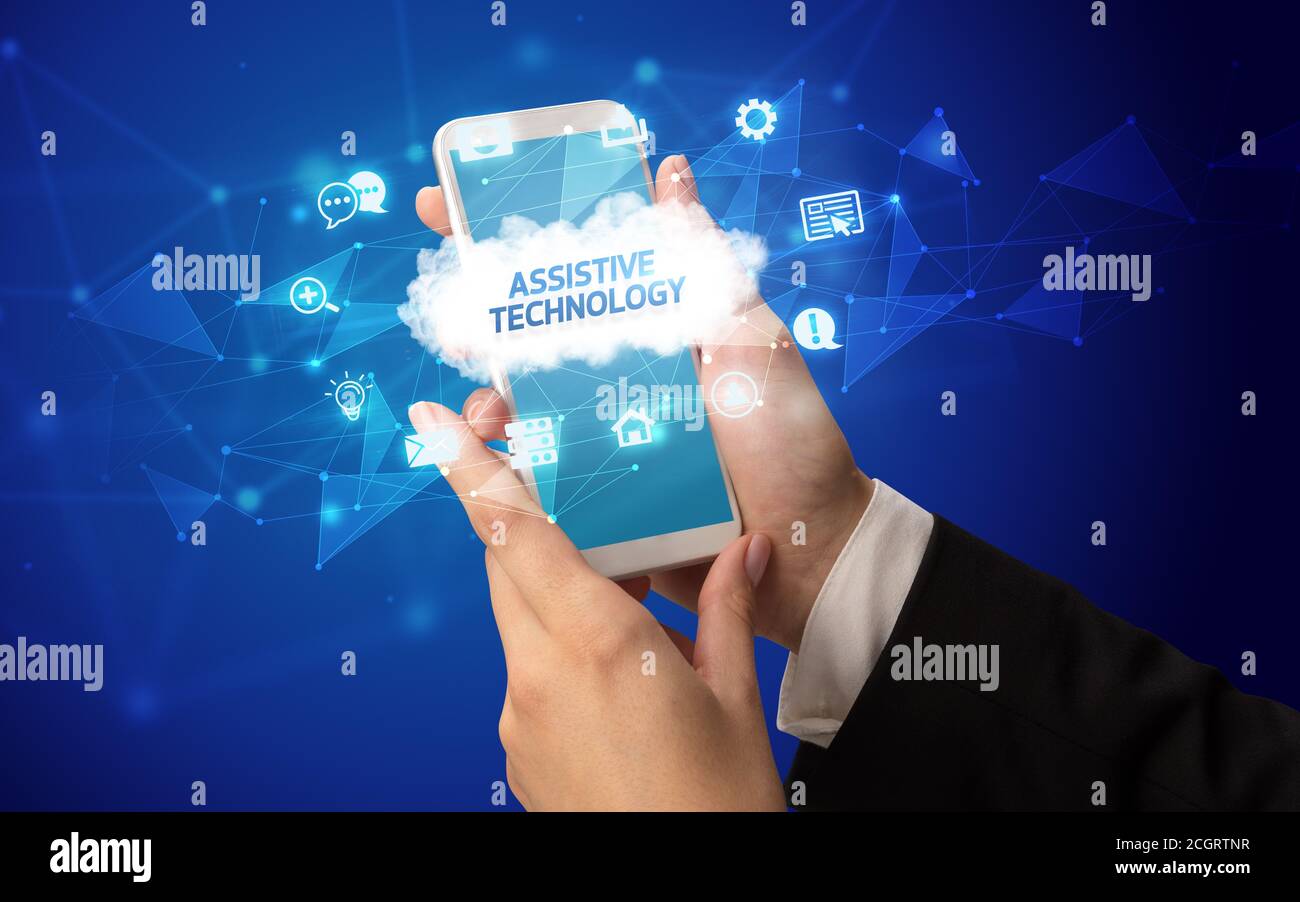 Female hand holding smartphone with ASSISTIVE TECHNOLOGY inscription ...