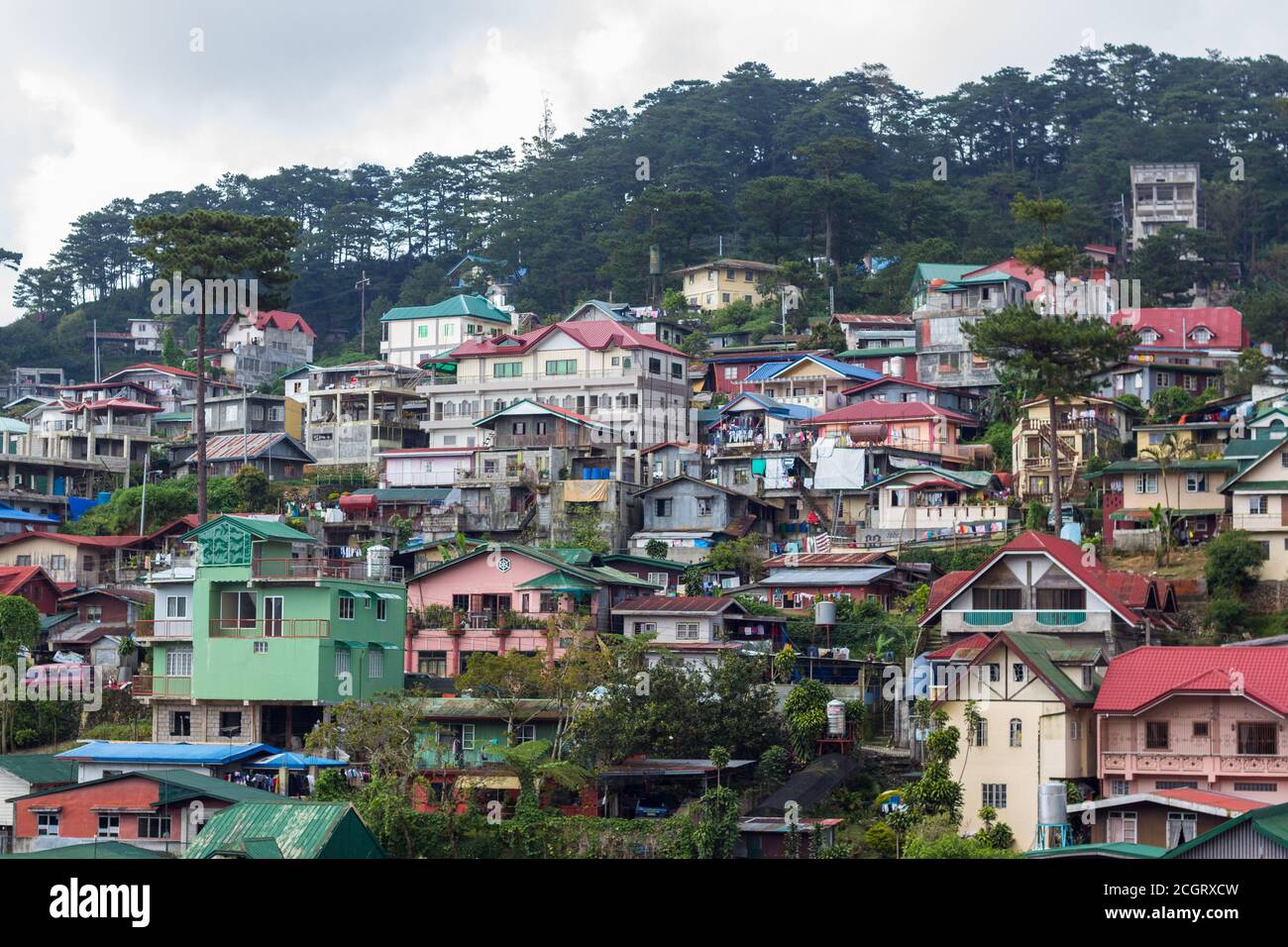 Houses crowd a slope in Baguio City Stock Photo - Alamy