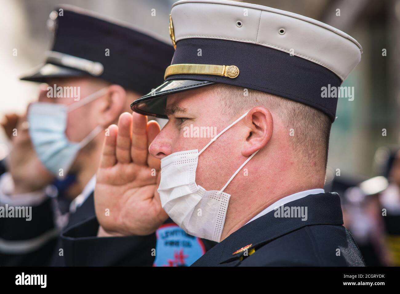 Family, friends and members of services of first responders attend 9/11 ...