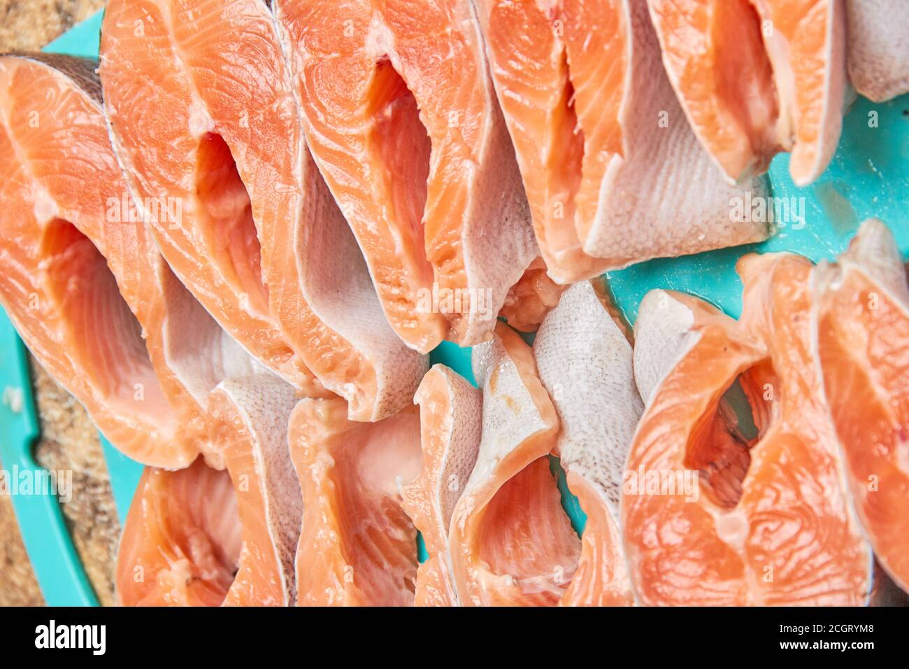 French fresh fish cut and spread on cutting board Stock Photo - Alamy