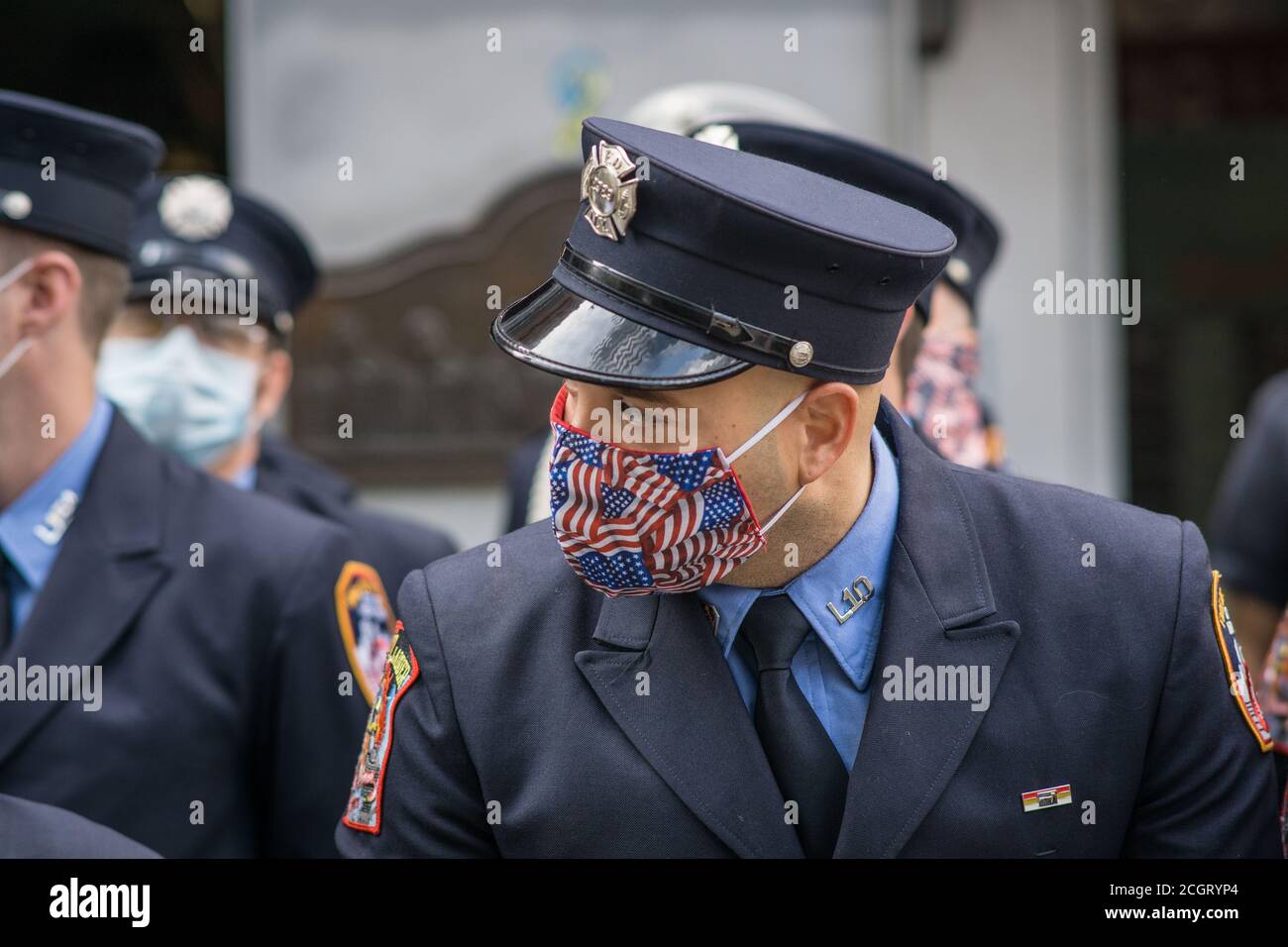 Family, friends and members of services of first responders attend 9/11 ...