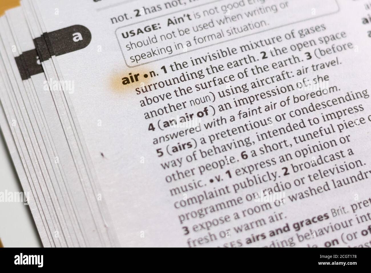 The word or phrase Air in a dictionary highlighted with marker Stock ...