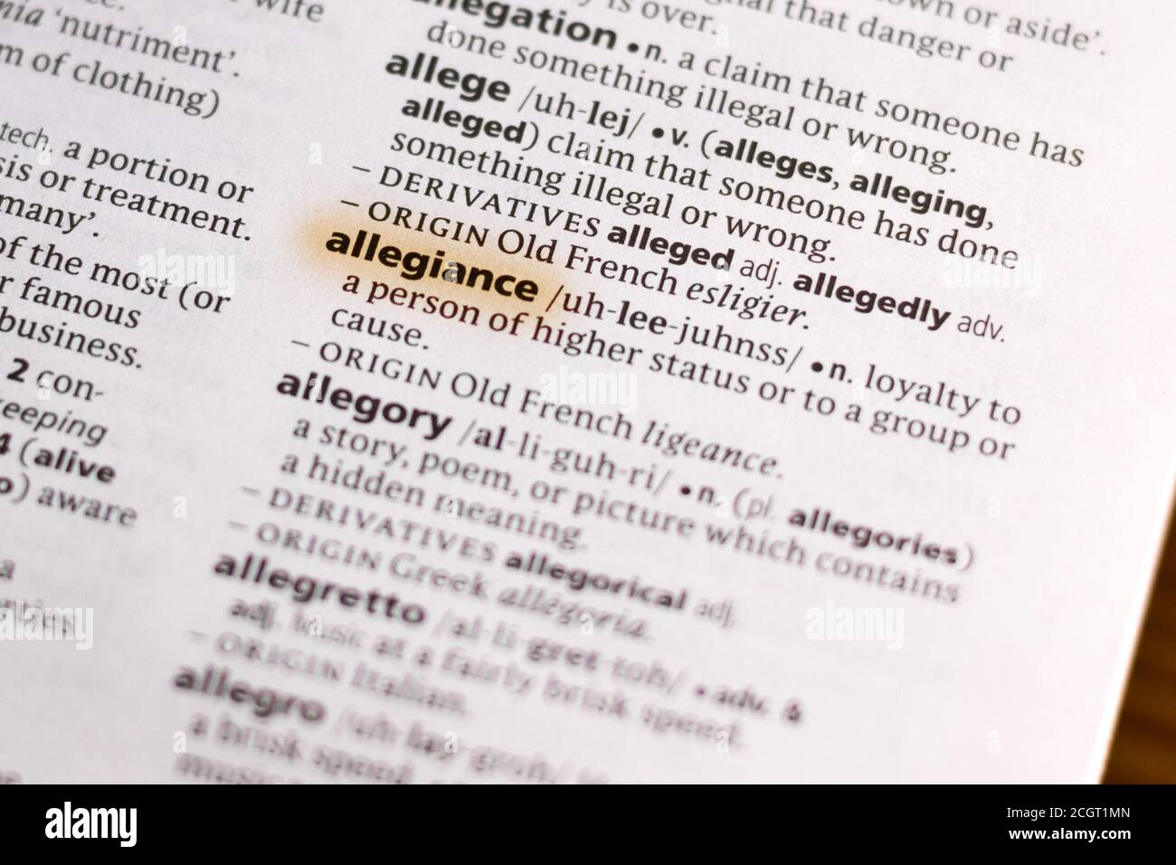 The word or phrase Allegiance in a dictionary highlighted with marker ...