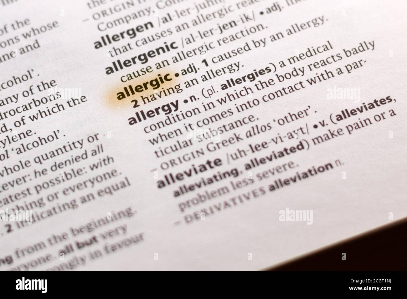 The word or phrase Allergic in a dictionary highlighted with marker ...
