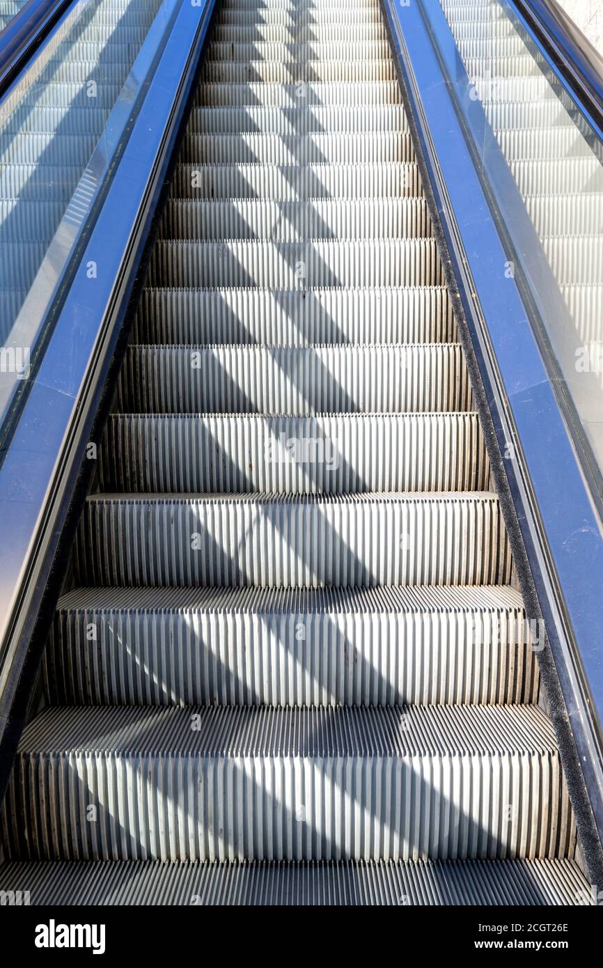 upwards view of an escalator under the open sky Stock Photo - Alamy